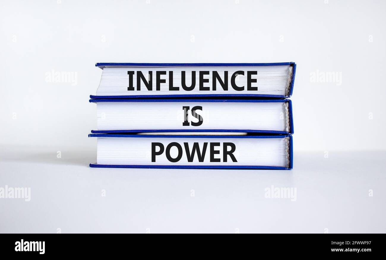 Influence is power symbol. Books with words 'Influence is power ...