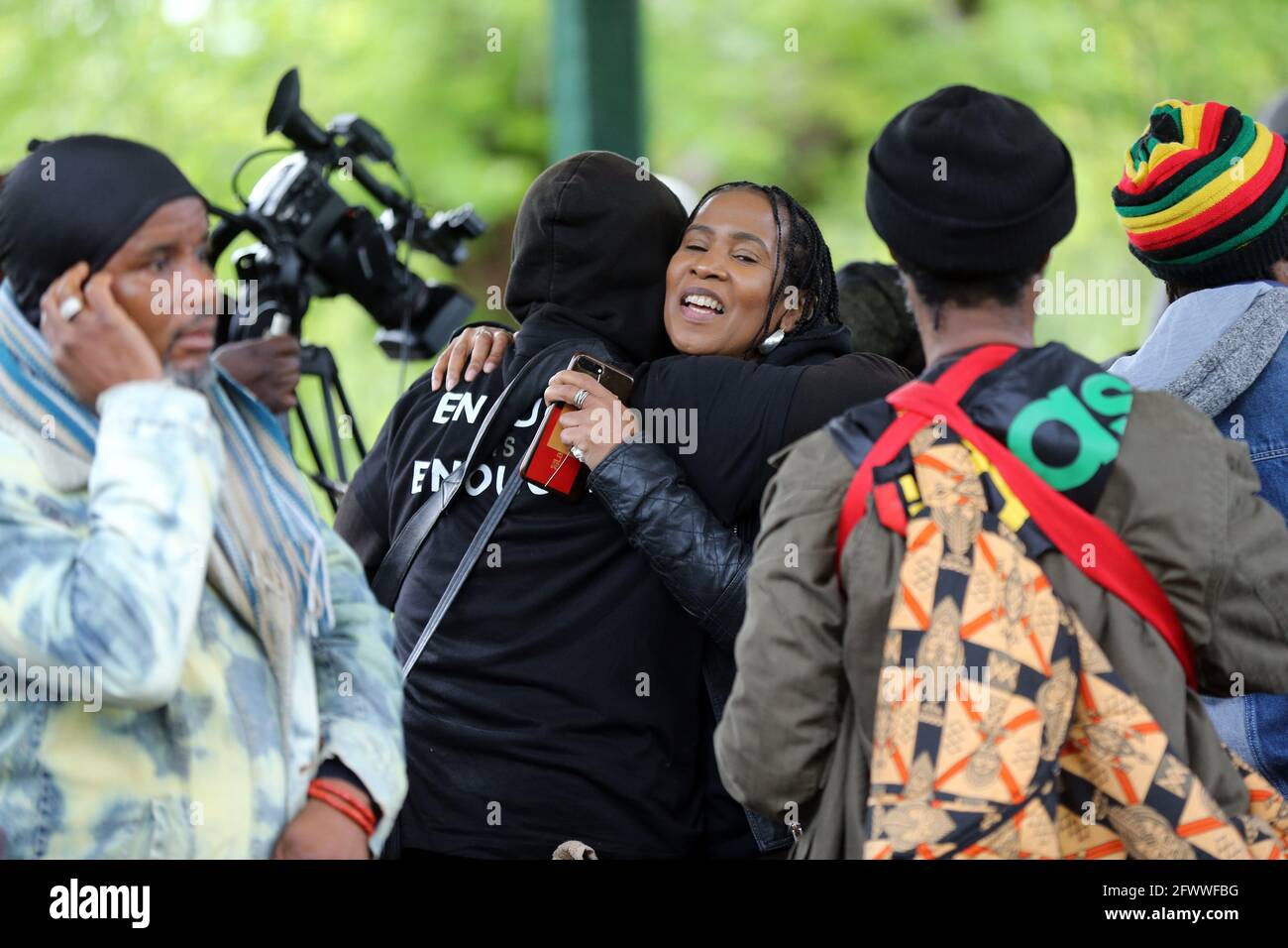 London, England, UK. 24th May, 2021. Friends and fellow activists held ...
