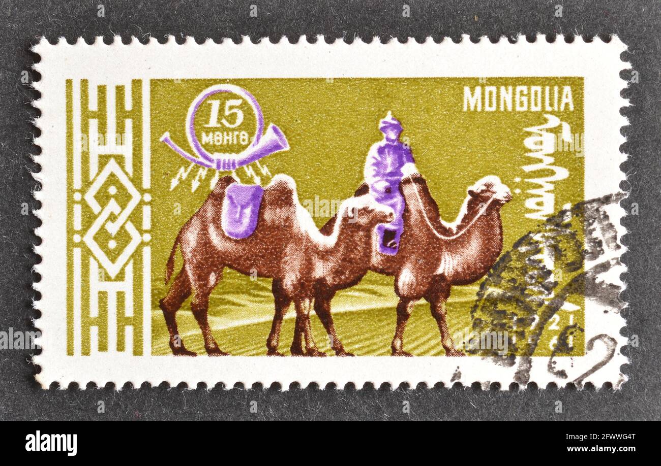 Cancelled postage stamp printed by Mongolia, that shows Postman on ...