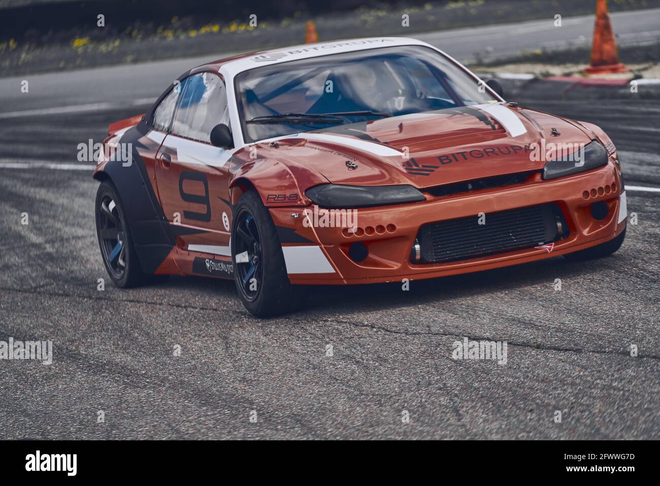 21-05-2021 Riga, Latvia car drifting on asphalt racing track with lot ...