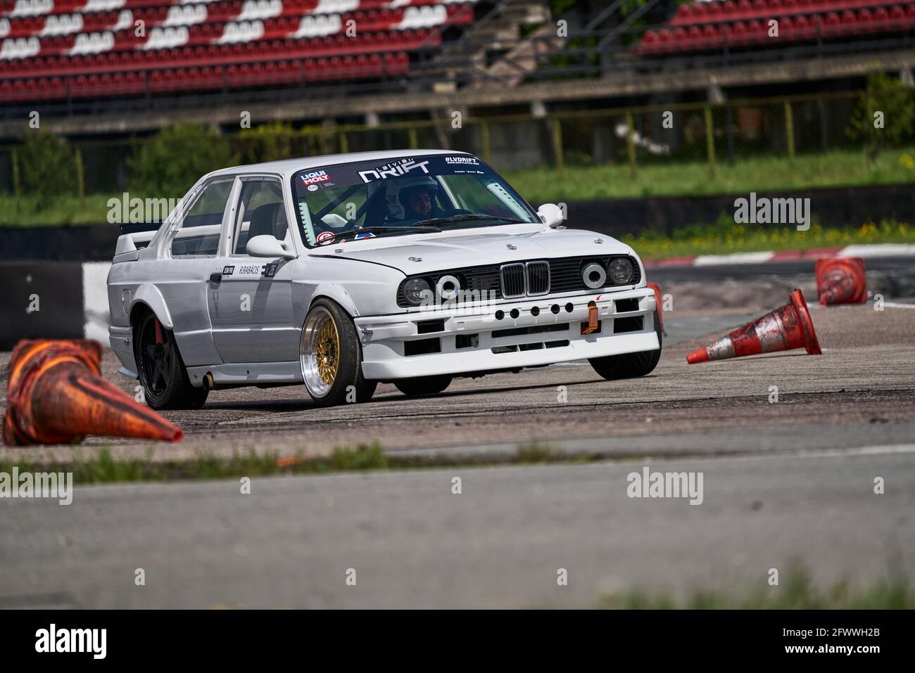 21-05-2021 Riga, Latvia car drifting on asphalt racing track with lot ...