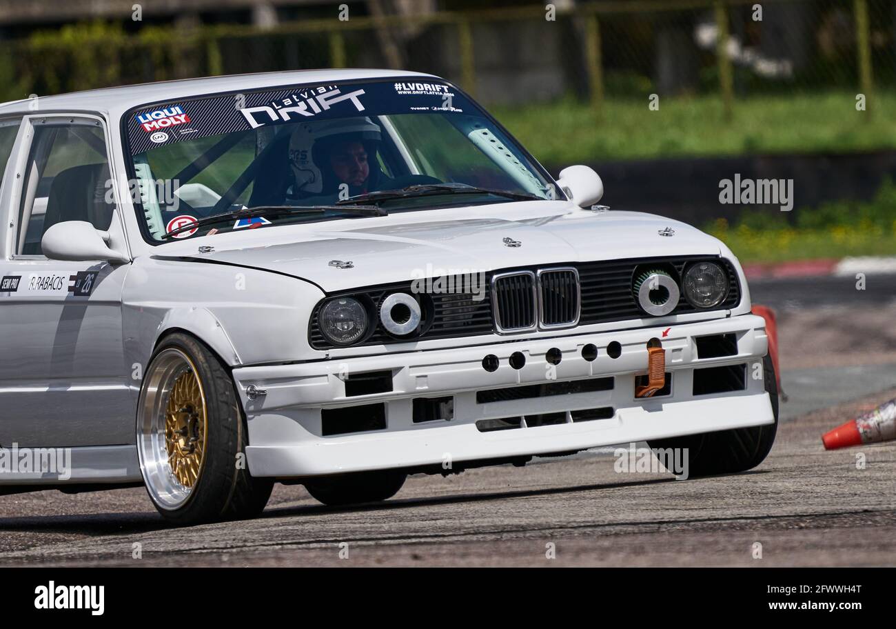 21-05-2021 Riga, Latvia car drifting on asphalt racing track with lot ...