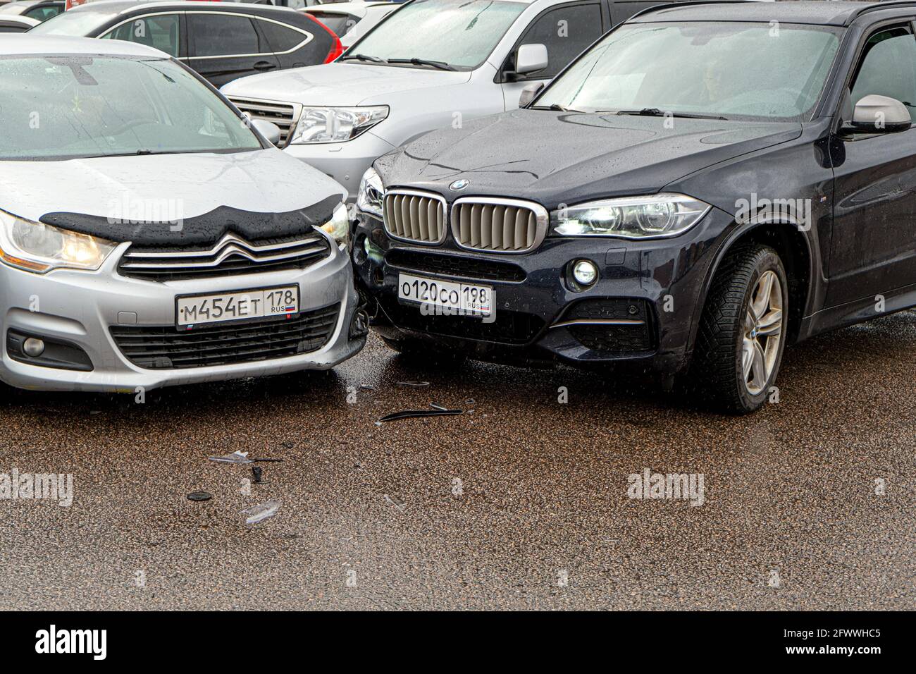 Collision of two cars. Broken bumper and hood. Car accident on the ...