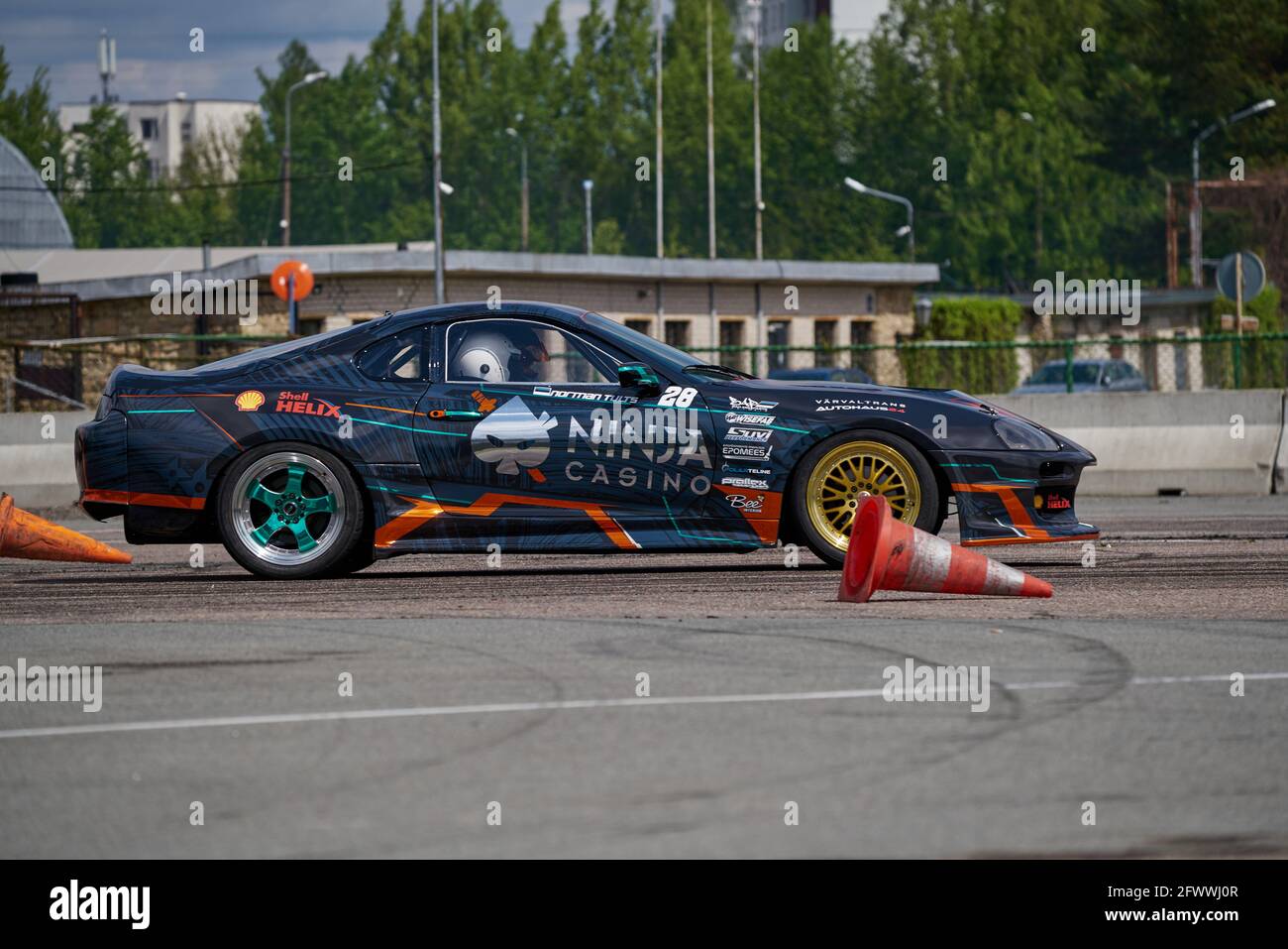 21-05-2021 Riga, Latvia car drifting on asphalt racing track with lot ...