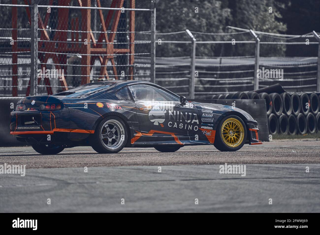 21-05-2021 Riga, Latvia car drifting on asphalt racing track with lot ...