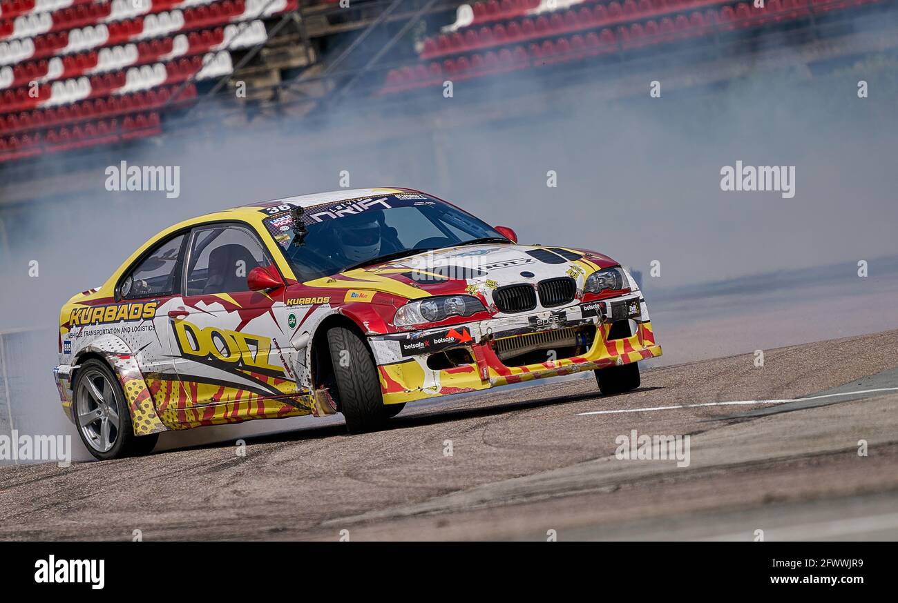 21-05-2021 Riga, Latvia car drifting on asphalt racing track with lot ...