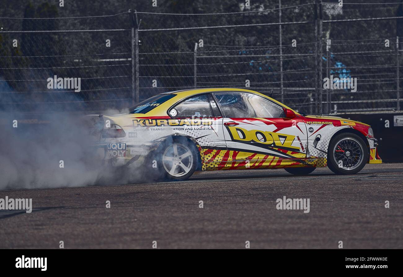 21-05-2021 Riga, Latvia car drifting on asphalt racing track with lot ...