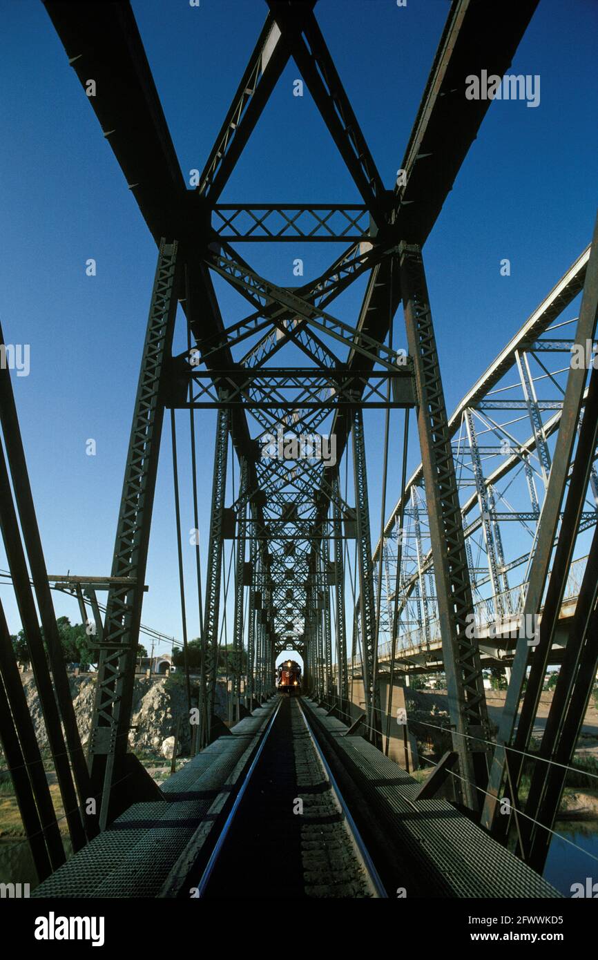 Iron Railroad Bridge with Train Stock Photo - Alamy