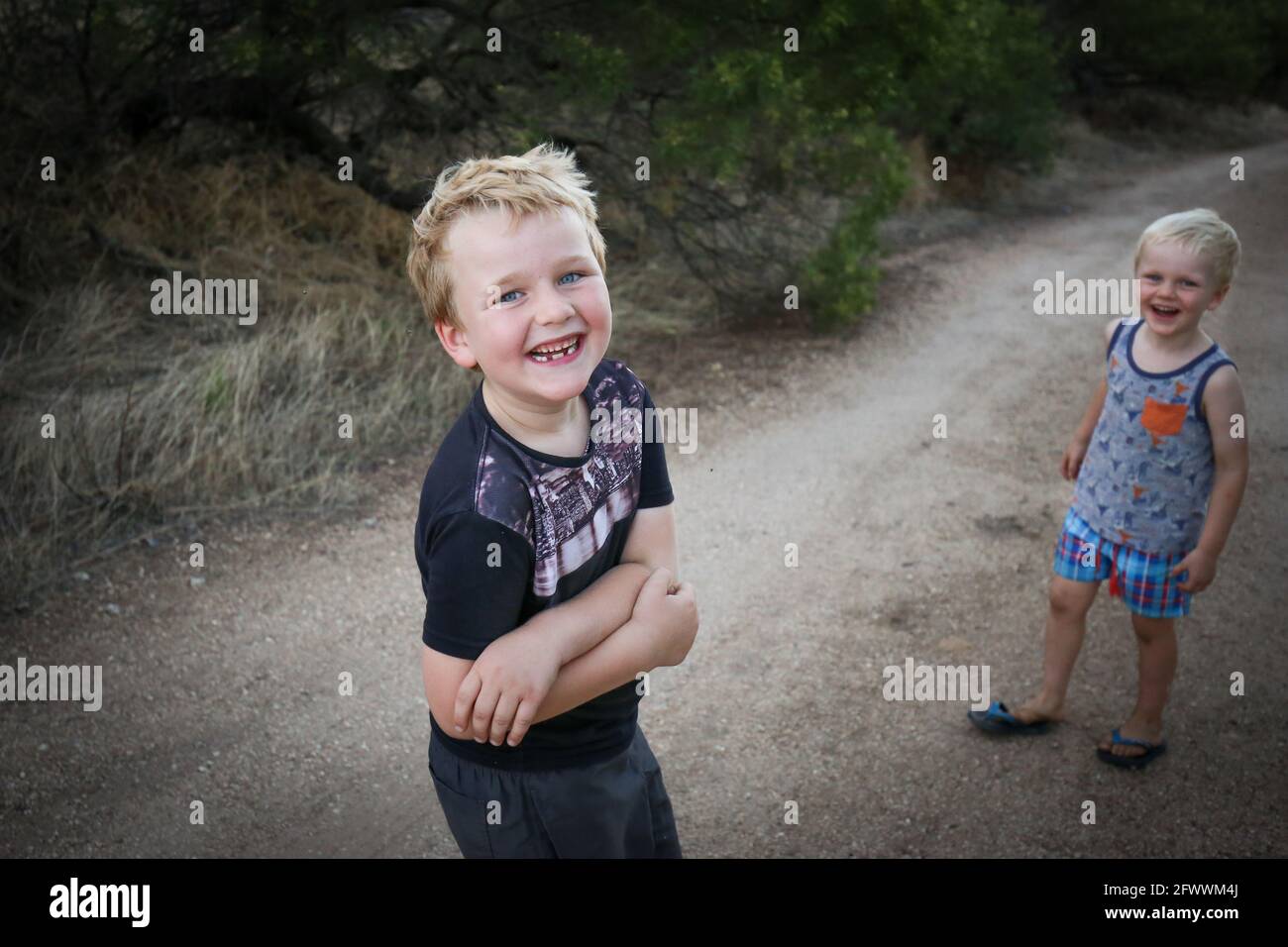 Closeup of two adorable Australian little boys laughing on the ...