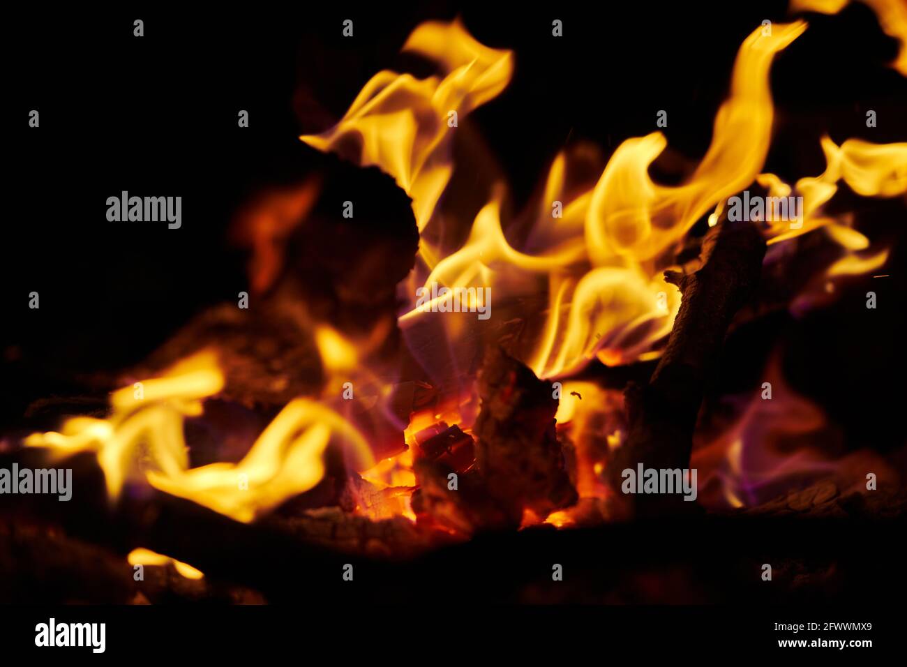 Close-up flame of burning wood in the fireplace Stock Photo - Alamy