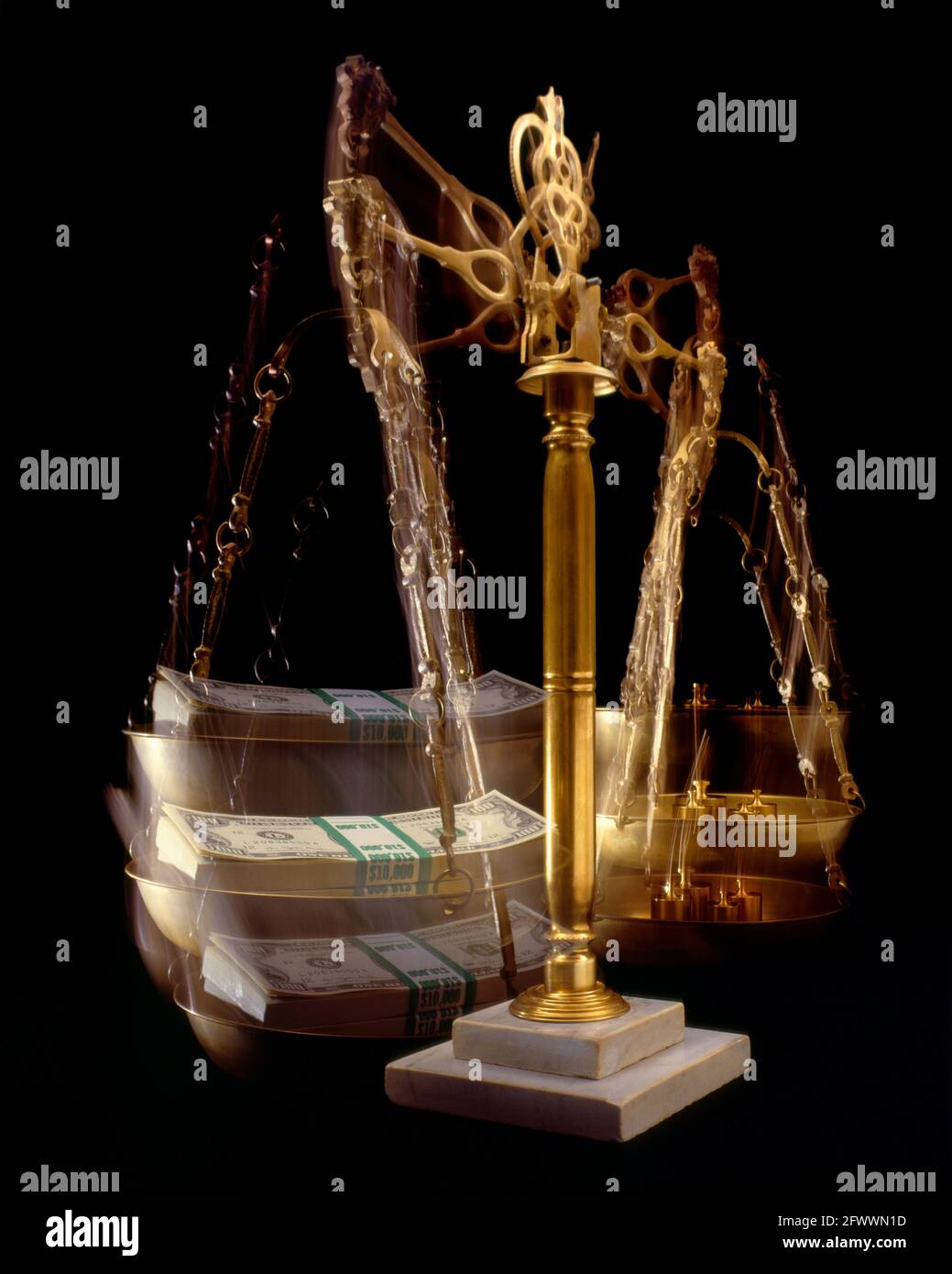 Money on Scale Stock Photo - Alamy