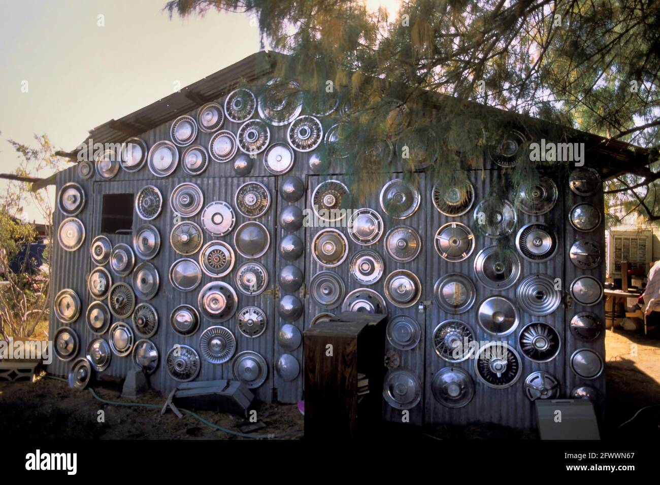 Garage Wall with Hubcaps Stock Photo - Alamy