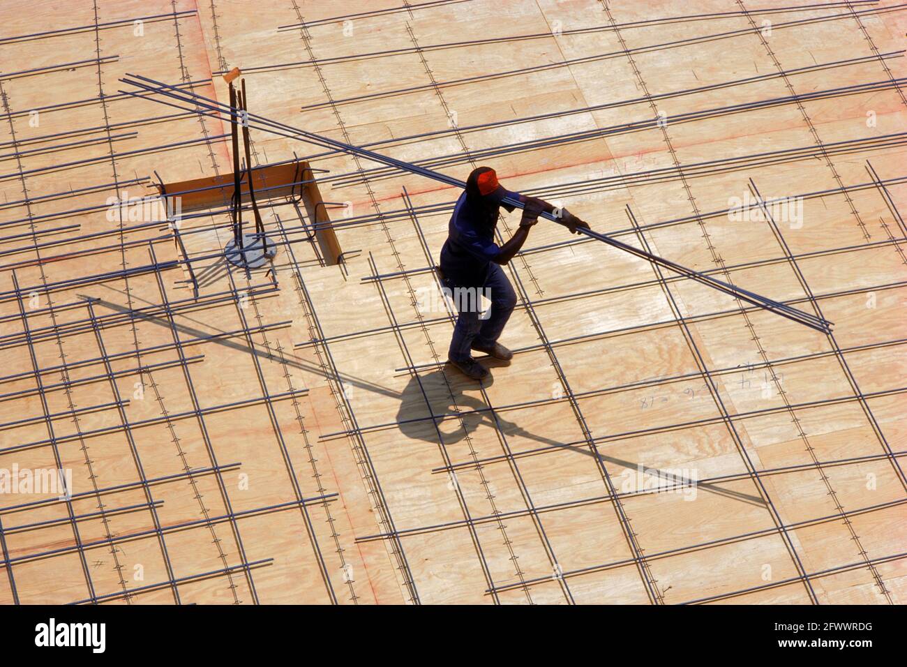 Construction Worker with Rebar Stock Photo - Alamy