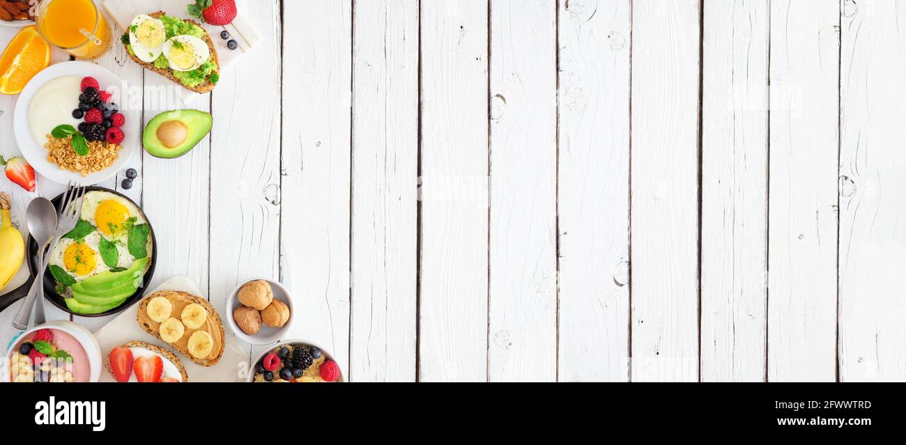 Healthy breakfast food banner with side border. Table scene with fruit ...