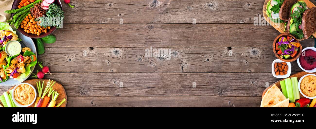 Healthy lunch food double side border. Table scene with nutritious ...