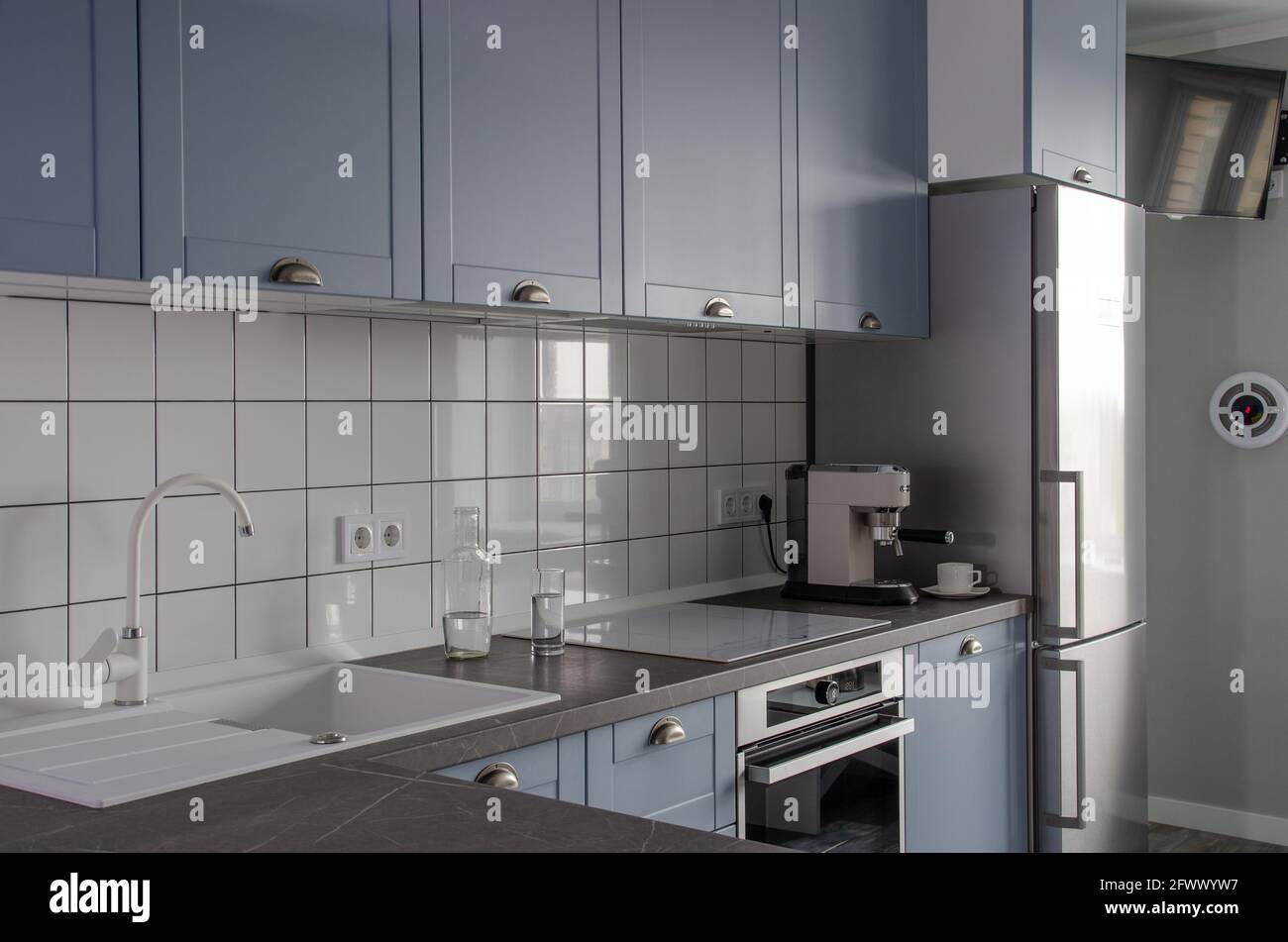 Minimalistic Scandinavian blue-gray kitchen. Clean background Stock ...