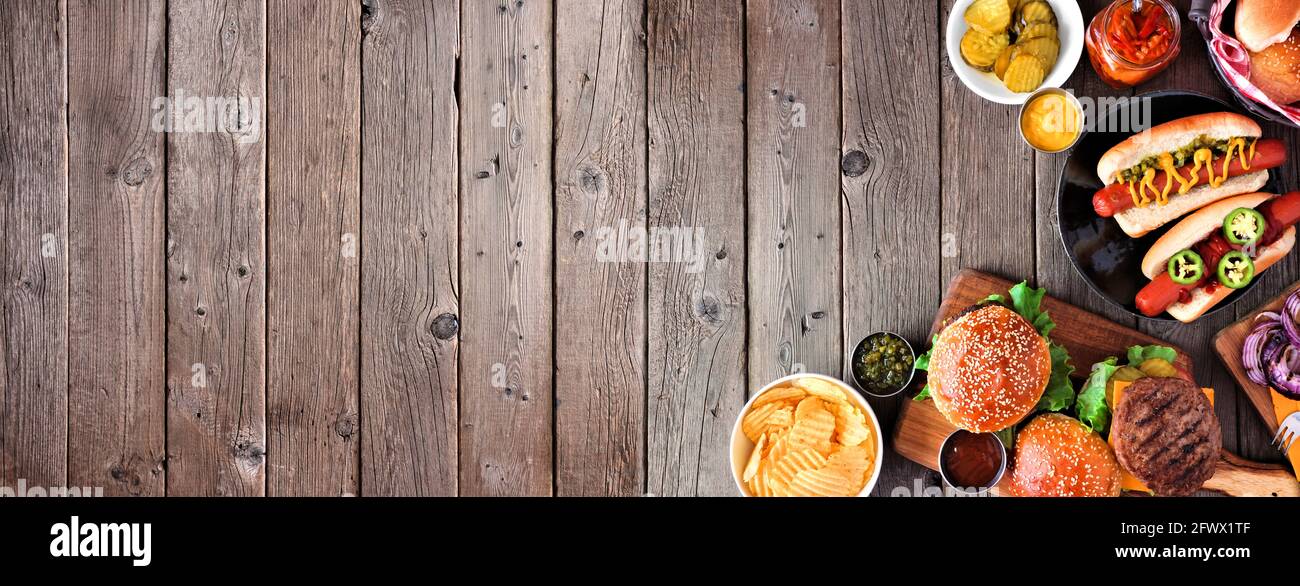 Summer BBQ food corner border with hot dog and hamburger buffet. Top ...
