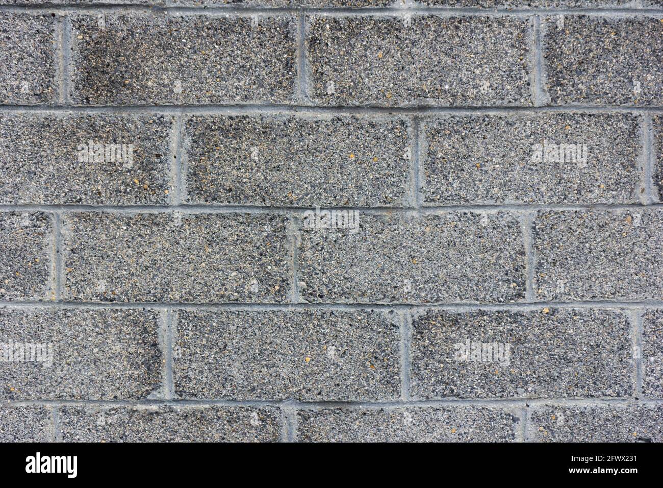 Concrete brick wall as a texture Stock Photo - Alamy