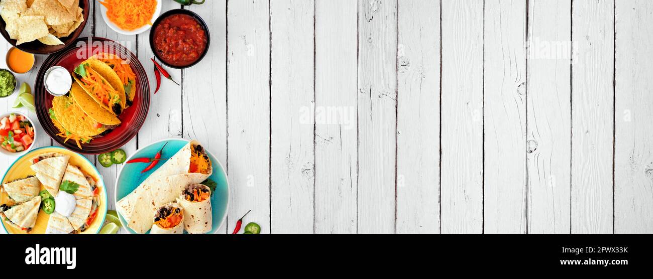 Mexican food corner border, top view over a white wood banner ...