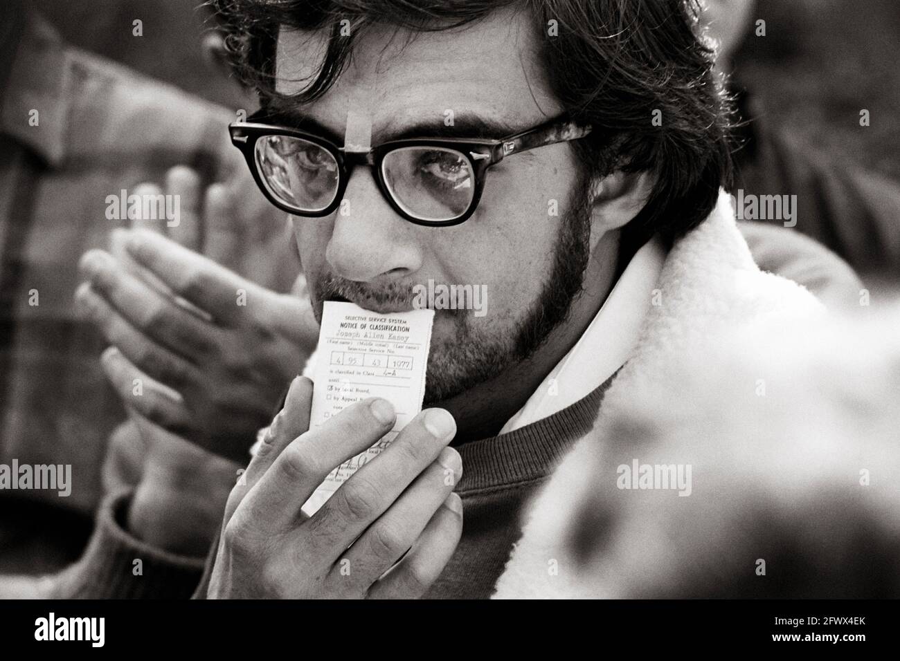 Protester Thinking About Burning Draft Card Stock Photo - Alamy