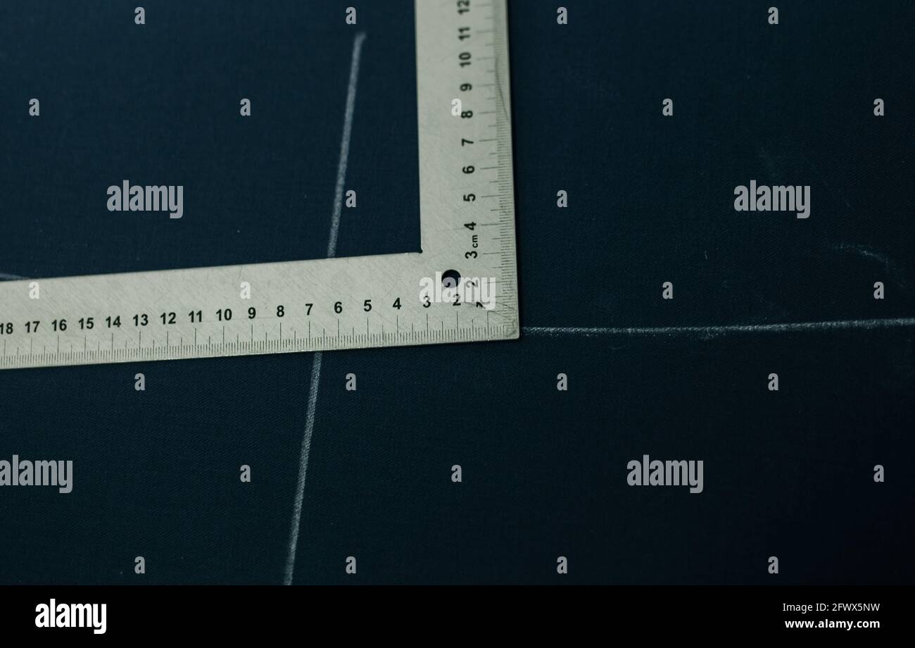 measuring ruler on the table with a cloth. cutter's workplace Stock ...