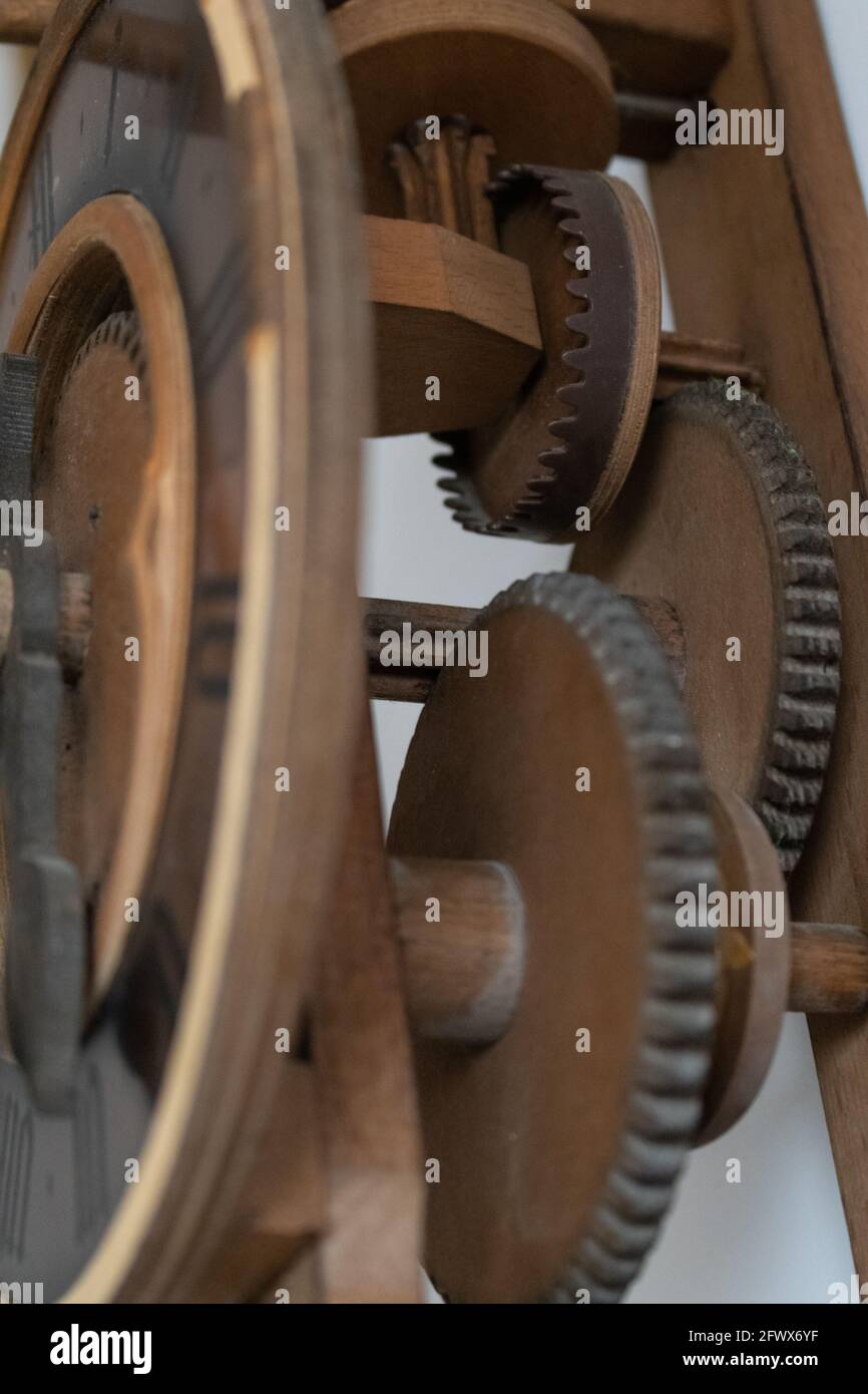 Wooden mechanism of the old clock Stock Photo - Alamy
