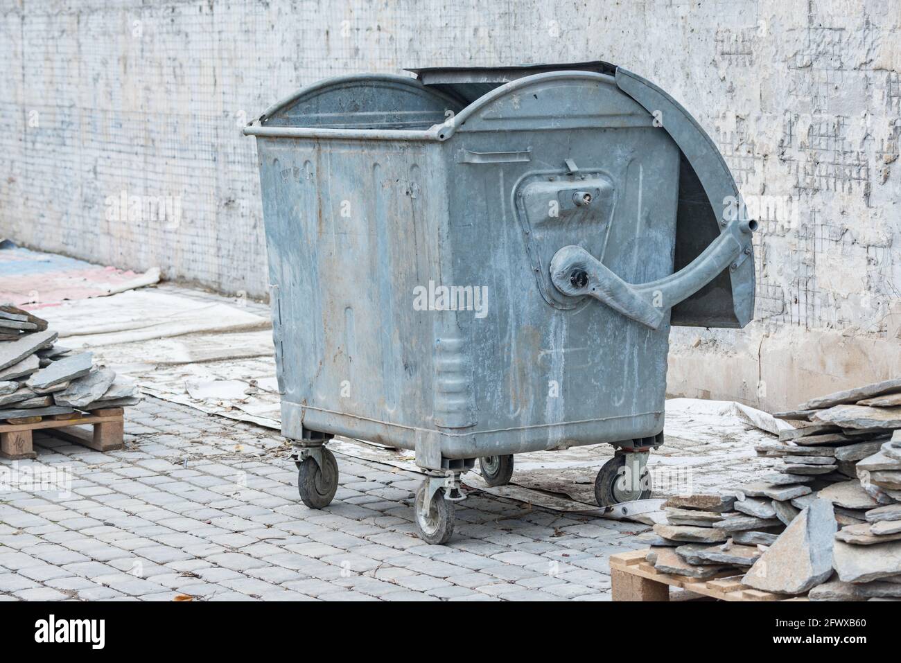 Container for the waste collection by the construction site Stock Photo ...