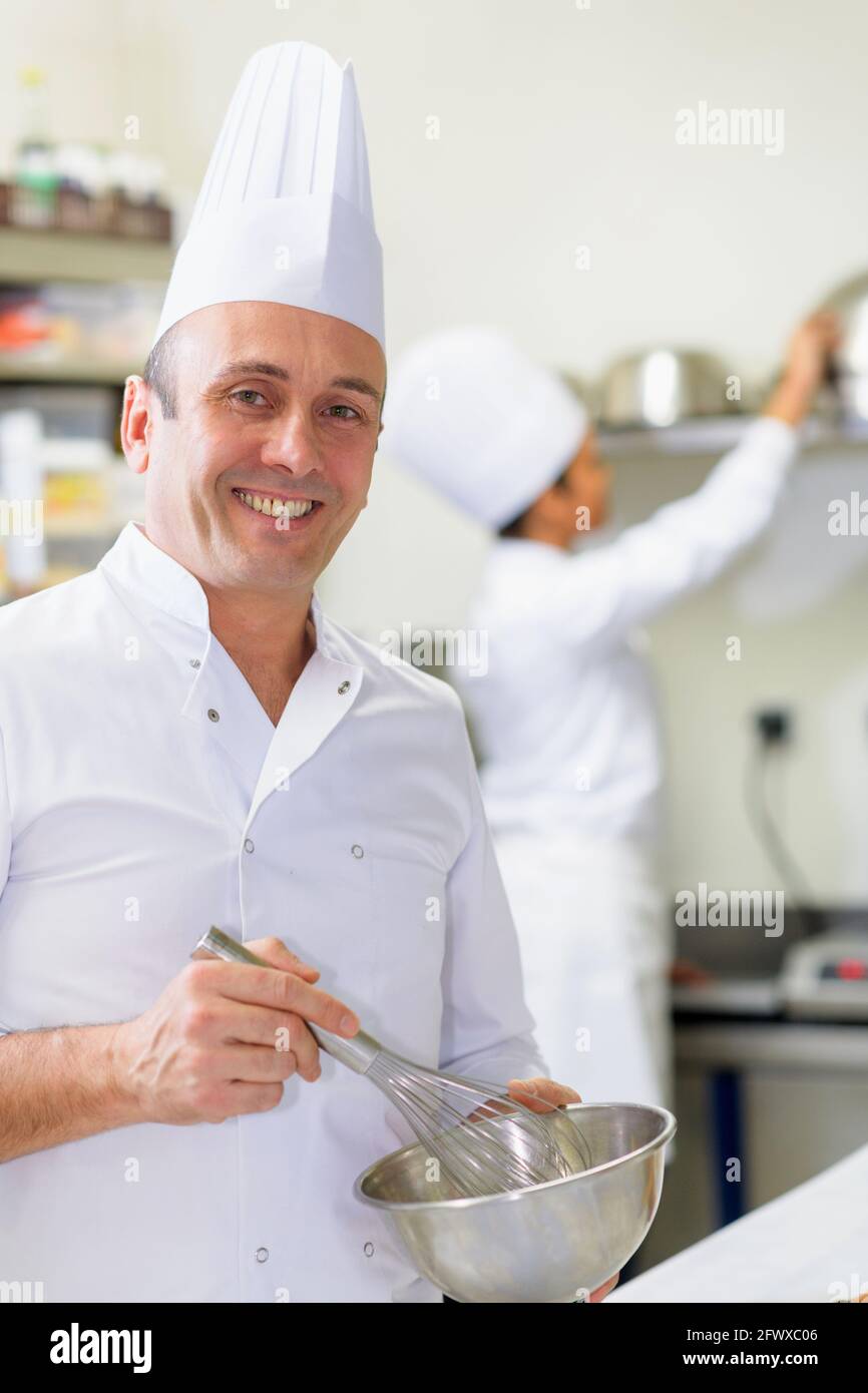 happy male chef cooking food at restaurant kitchen Stock Photo - Alamy