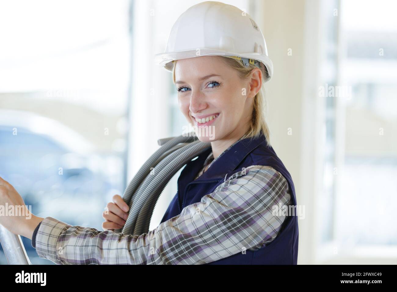 Electrical engineer woman checking voltage hi-res stock photography and ...