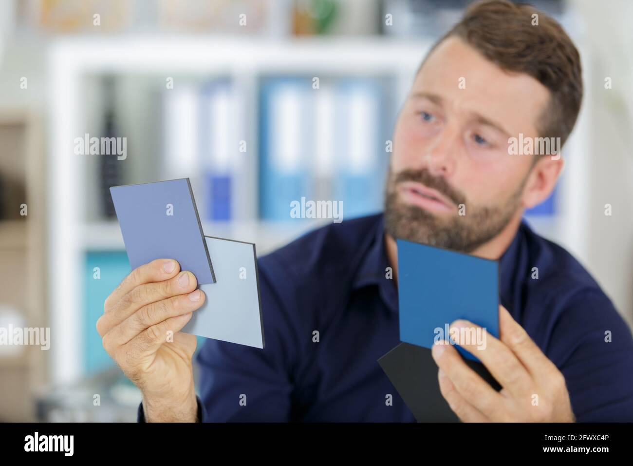 Person holding paint samples hi-res stock photography and images - Alamy