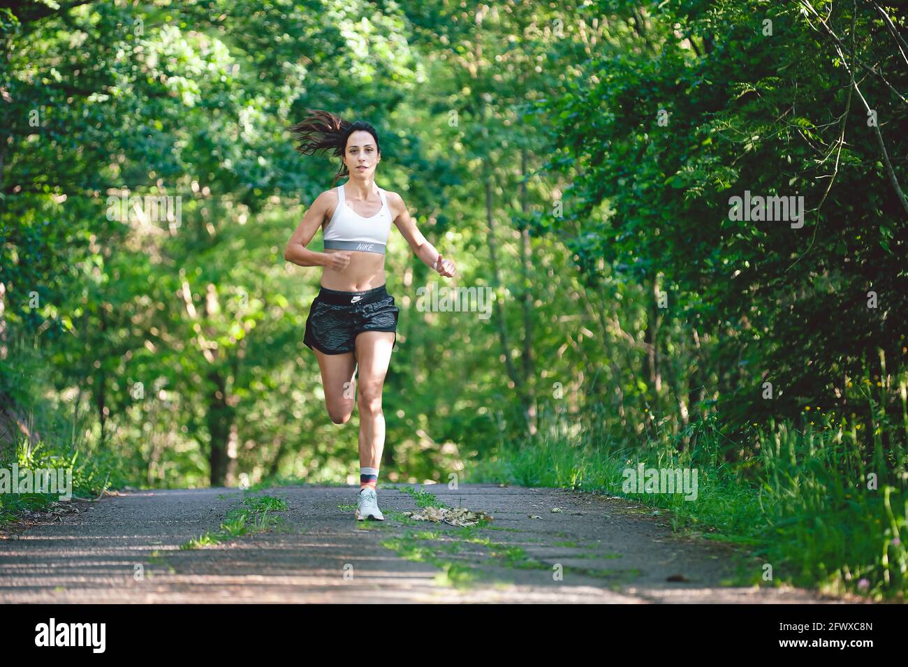 Girl running in nature, it is her healthy and free lifestyle Stock ...