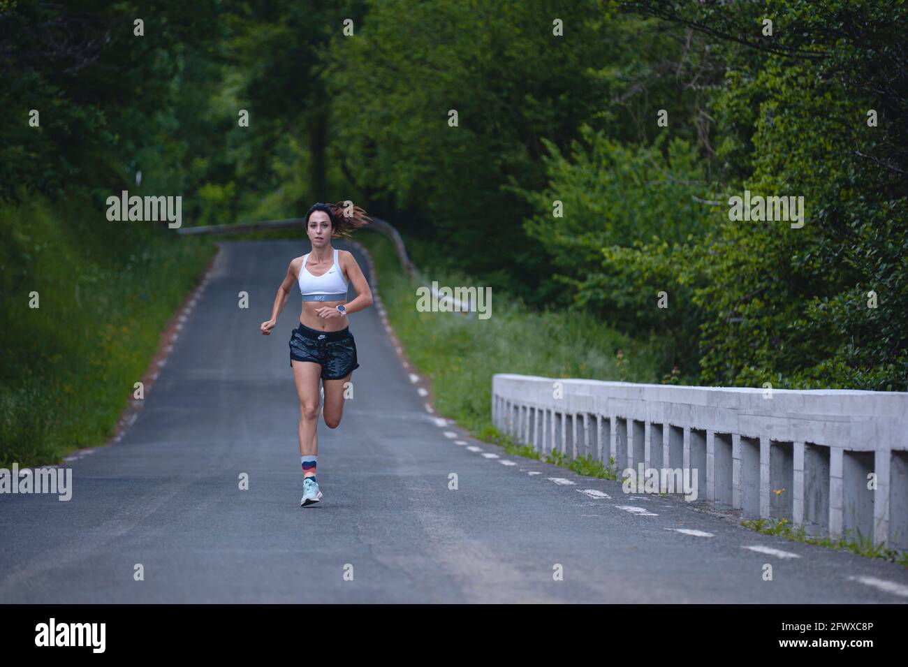 Girl running in nature, it is her healthy and free lifestyle Stock ...