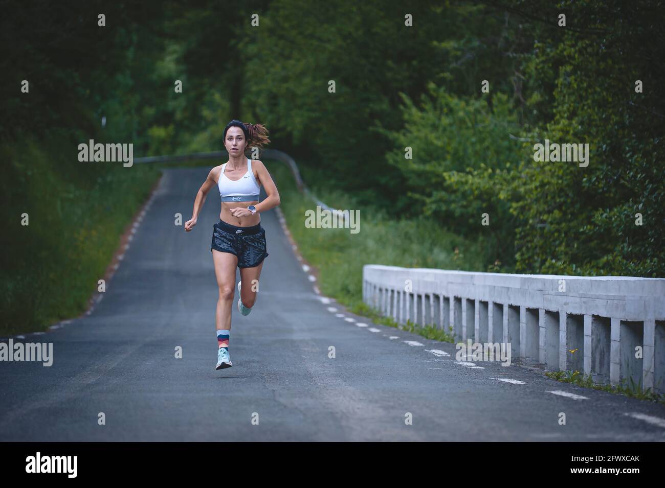 Girl running in nature, it is her healthy and free lifestyle Stock ...