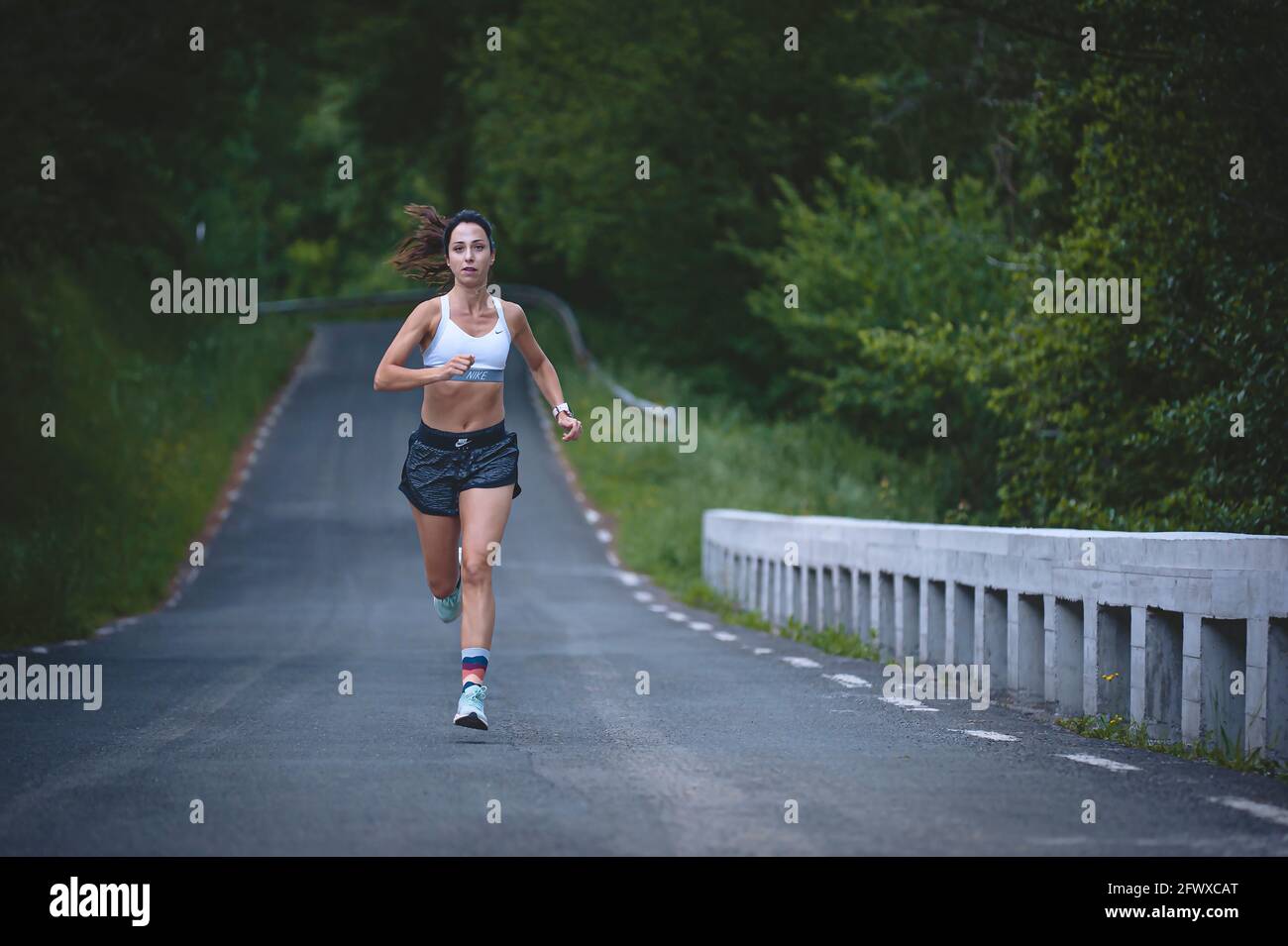 Girl running in nature, it is her healthy and free lifestyle Stock ...
