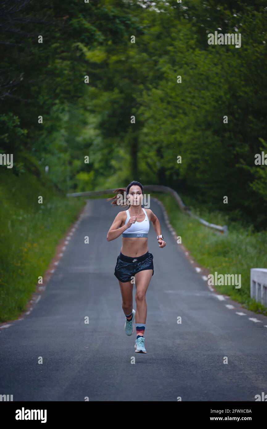 Girl running in nature, it is her healthy and free lifestyle Stock ...