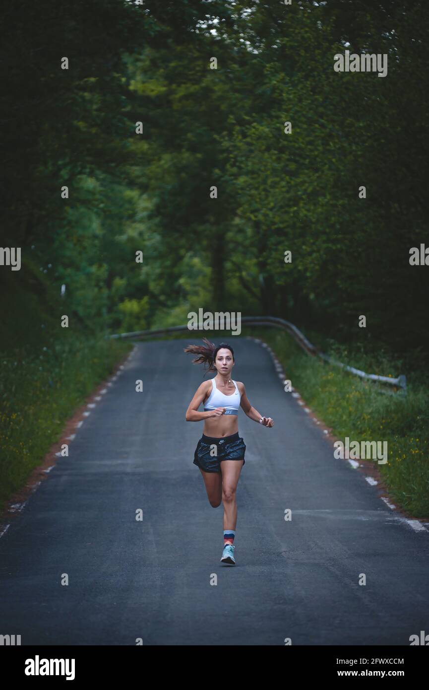 Girl running in nature, it is her healthy and free lifestyle Stock ...