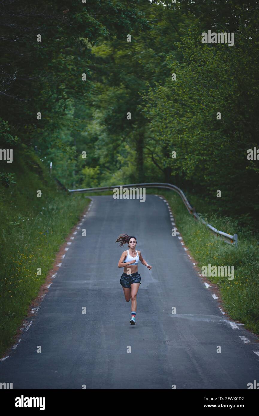 Girl running in nature, it is her healthy and free lifestyle Stock ...