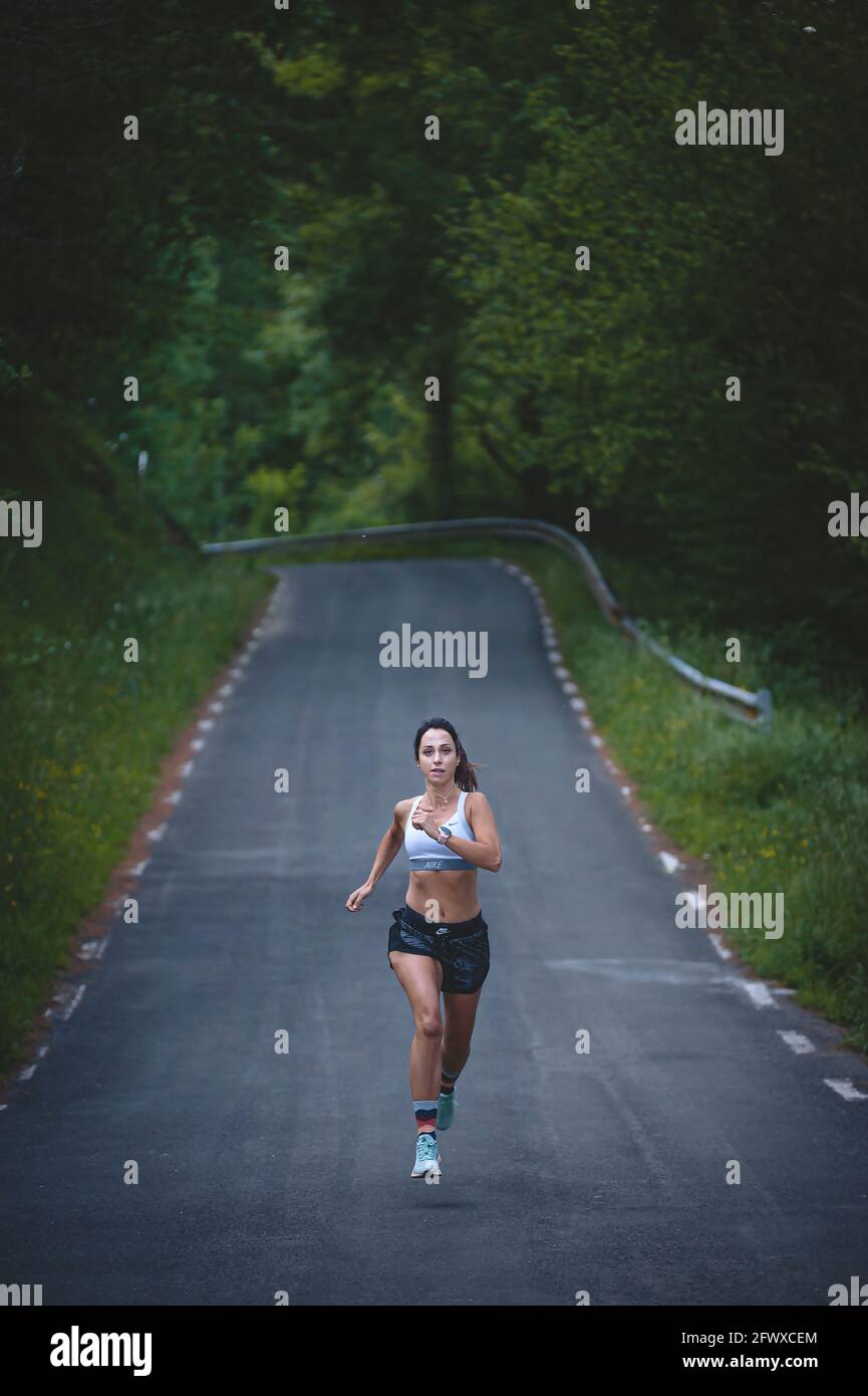 Girl running in nature, it is her healthy and free lifestyle Stock ...