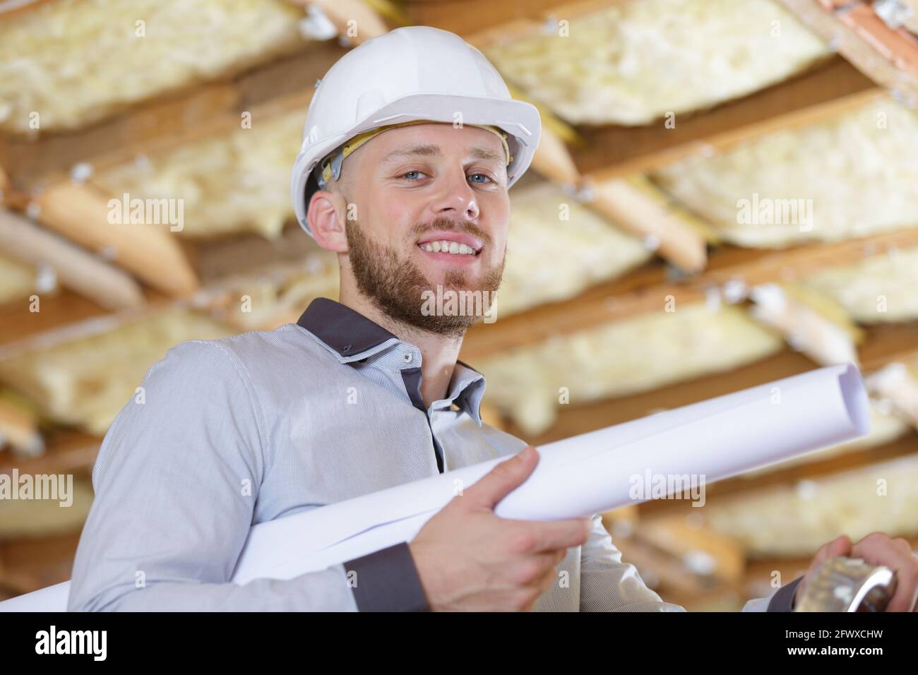 Engineer holding layout drawing hi-res stock photography and images - Alamy