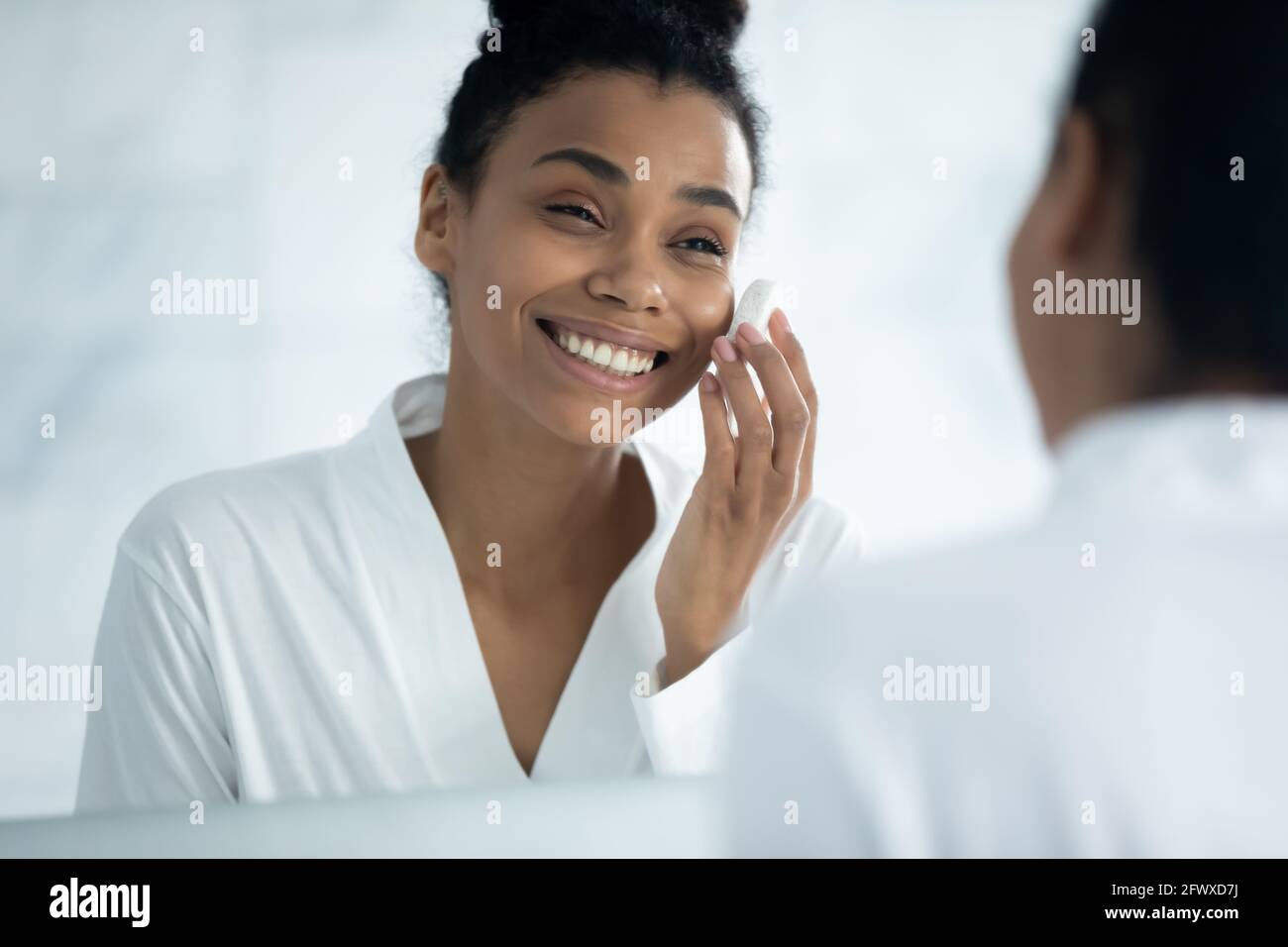 Happy cosmetic product consumer satisfied with moisturizing cream Stock ...