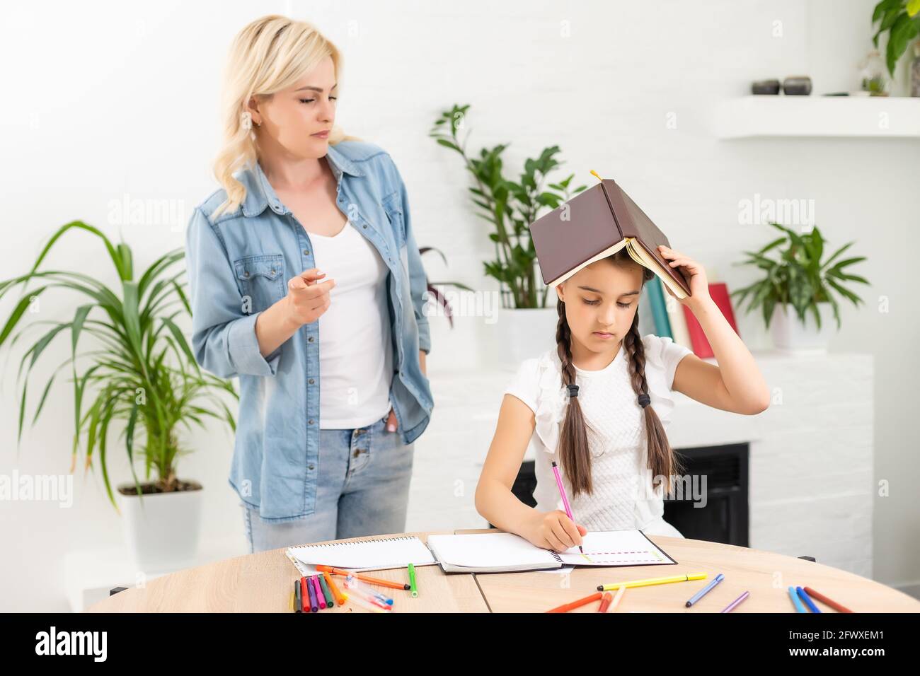 mother daughter study together at home Stock Photo - Alamy