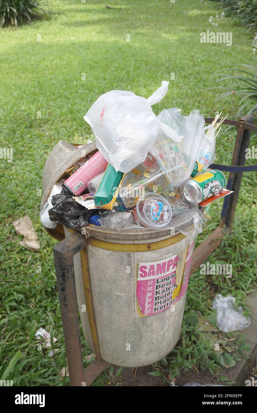 The dustbin with natural background Stock Photo - Alamy