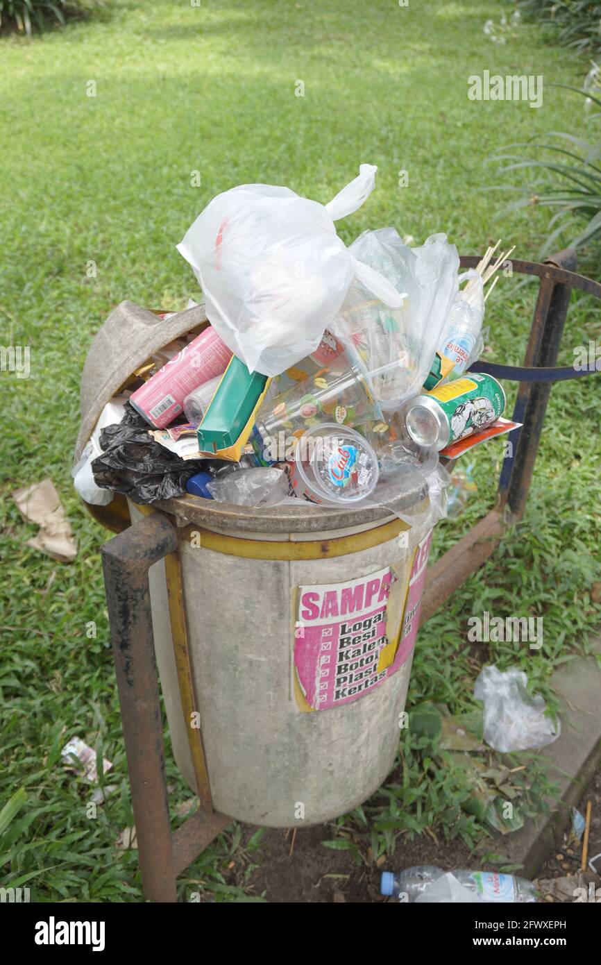 The dustbin with natural background Stock Photo - Alamy