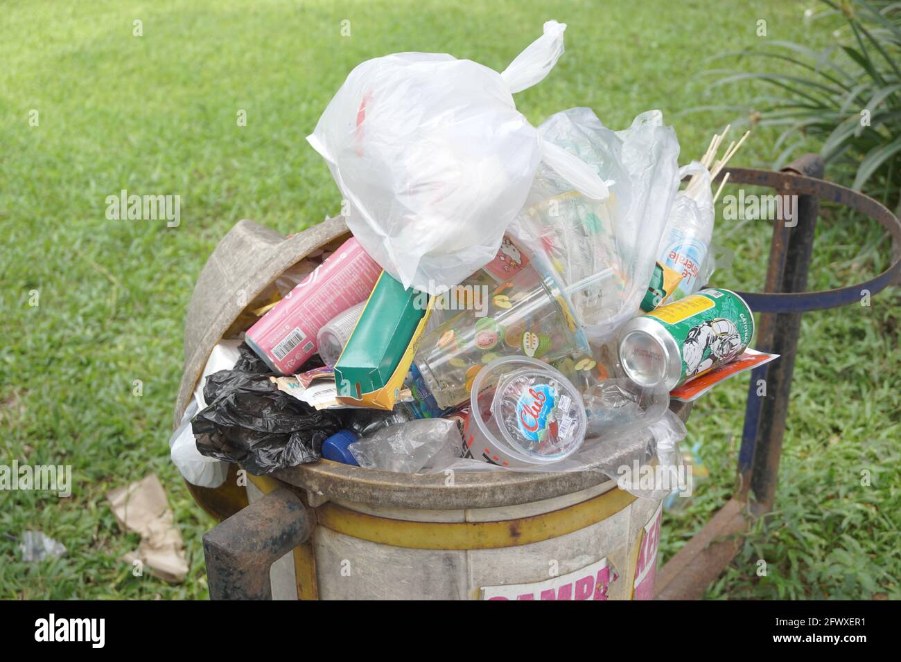The dustbin with natural background Stock Photo - Alamy