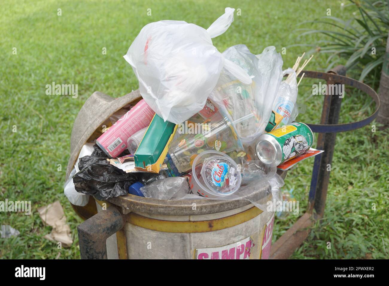 The dustbin with natural background Stock Photo - Alamy