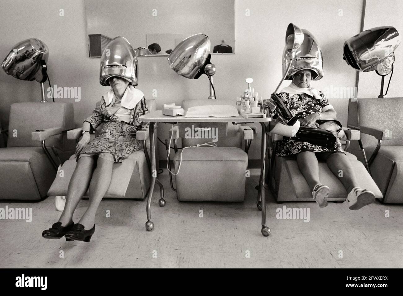Two Ladies Under Hair Dryers Stock Photo - Alamy