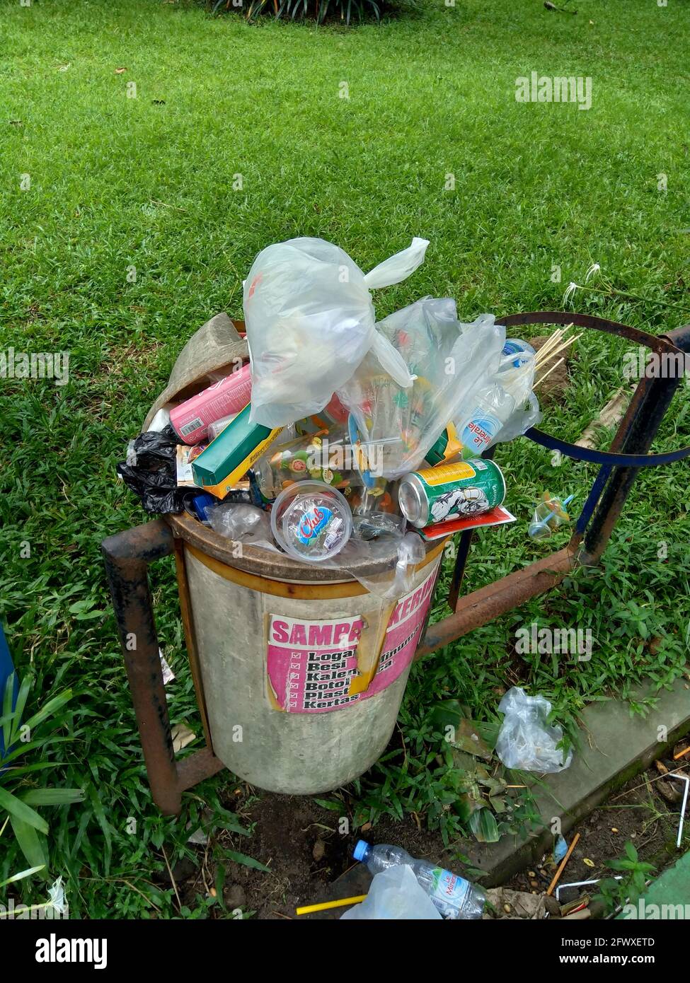 The dustbin with natural background Stock Photo - Alamy