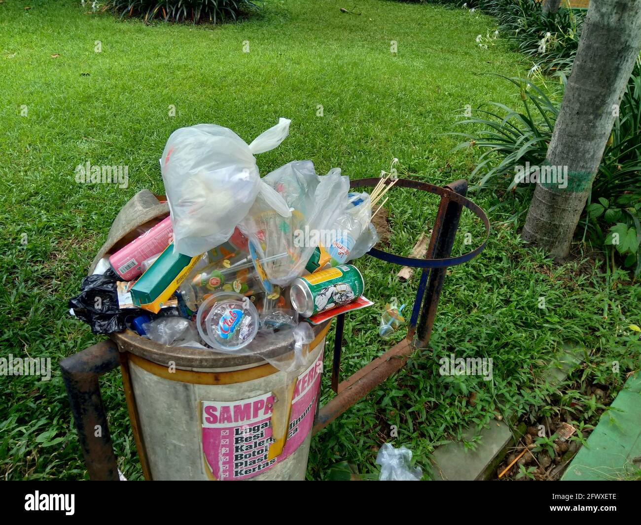 The dustbin with natural background Stock Photo - Alamy