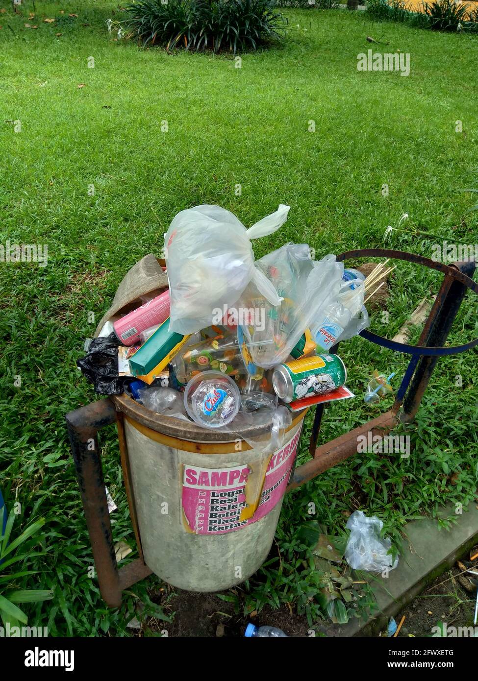 The dustbin with natural background Stock Photo - Alamy