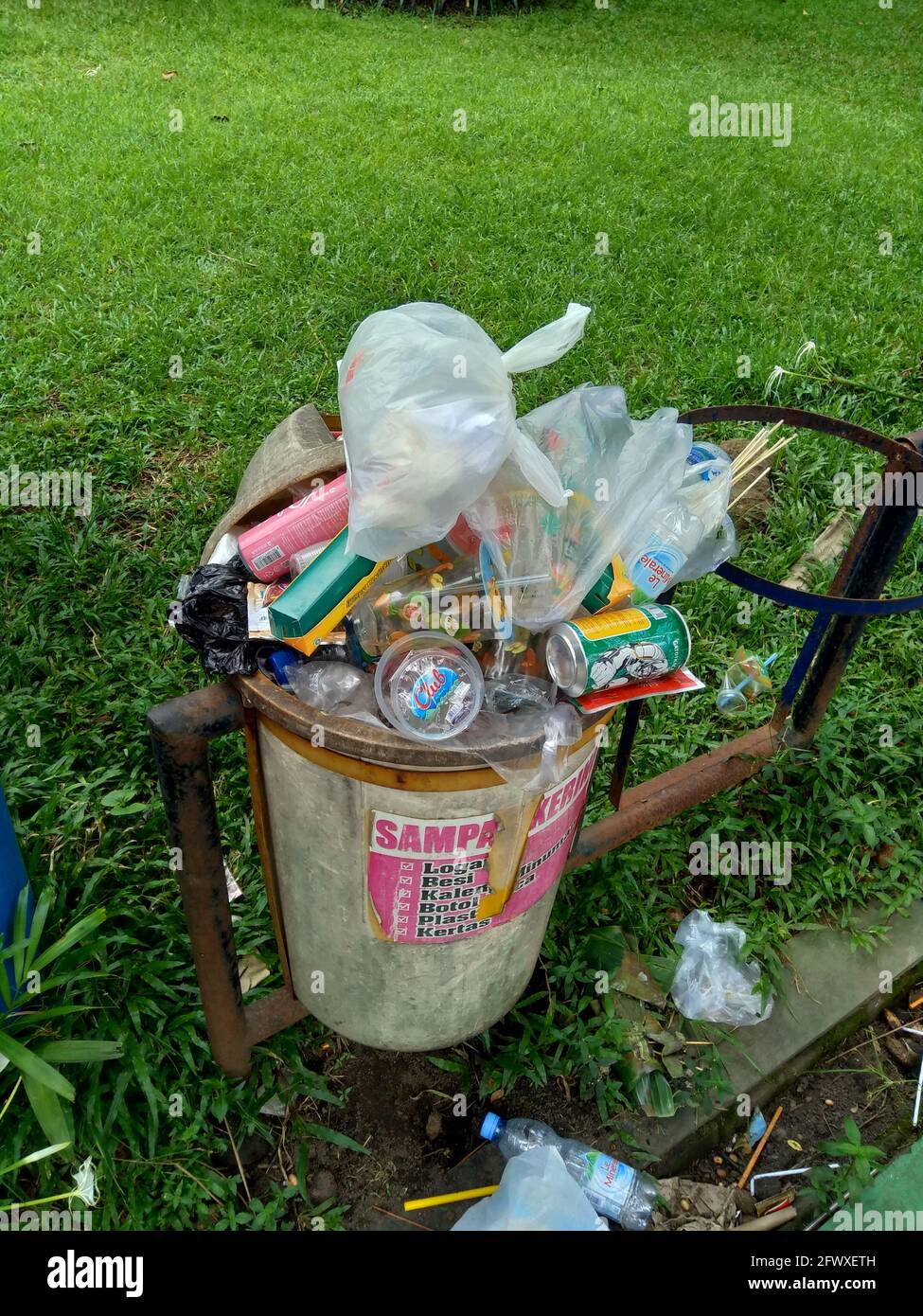 The dustbin with natural background Stock Photo - Alamy